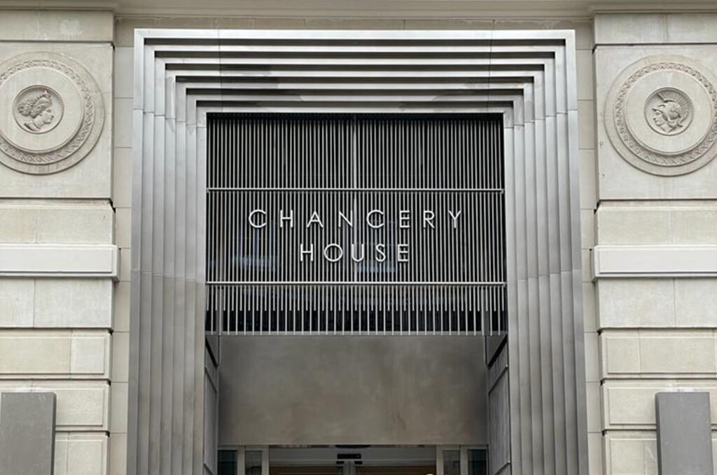 Entrance portal and signage, Chancery House, 53-64 Chancery Ln, London ...
